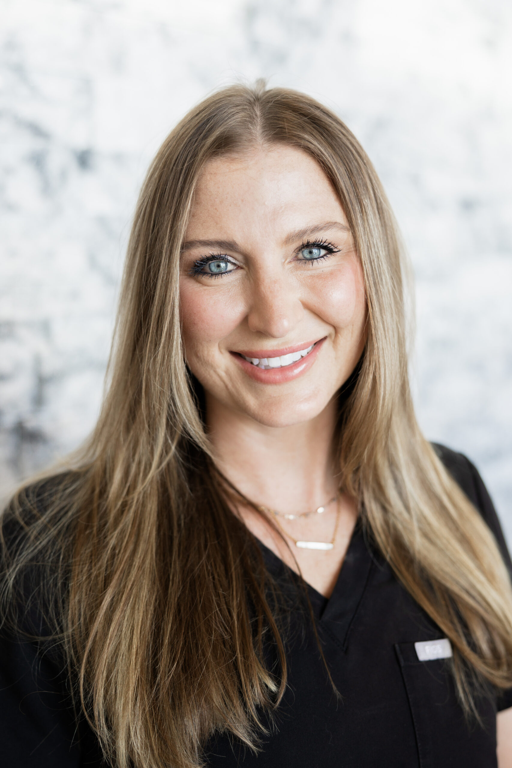 Dr. Kelli Hahn - Hairstylist | Colair Beauty Lounge & Med Spa